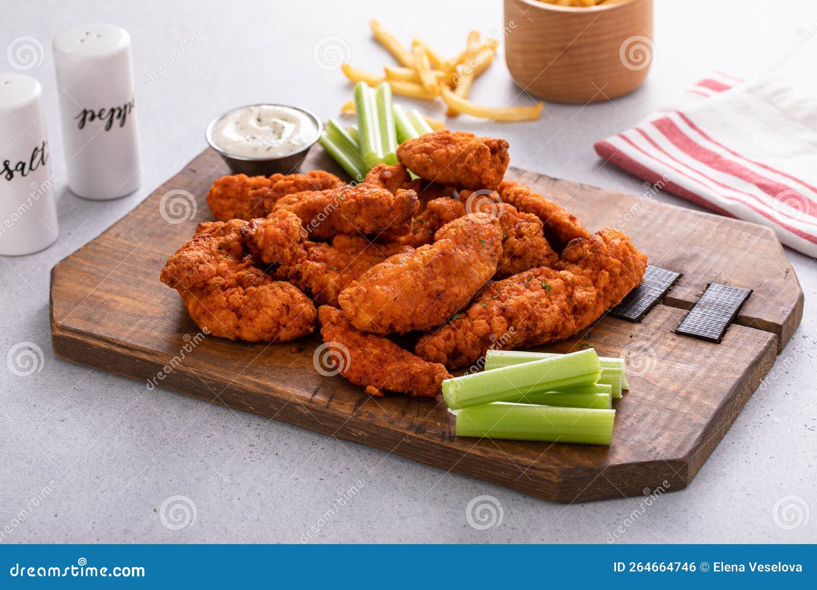Buffalo Chicken Fingers Served with Celery and Ranch Stock Photo ...