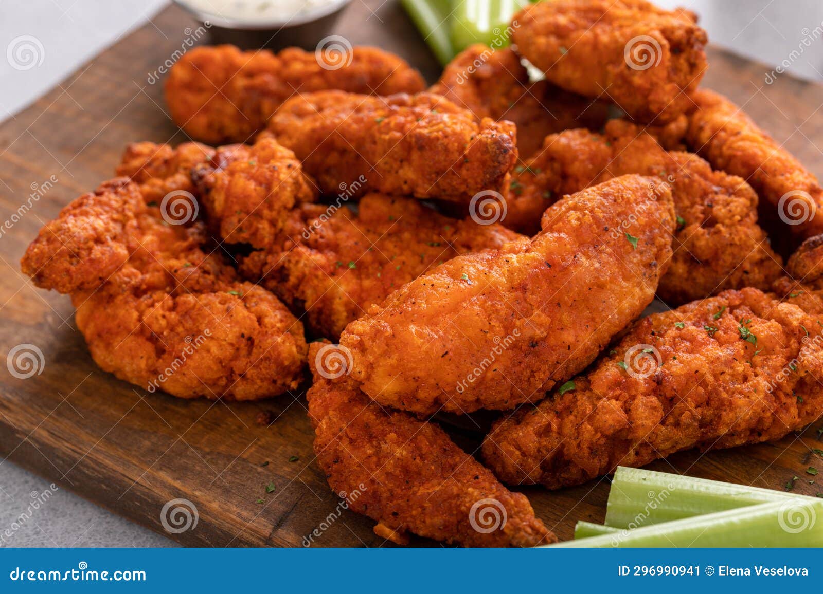 Buffalo Chicken Strips on a Board with Ranch and Celery Stock Image ...