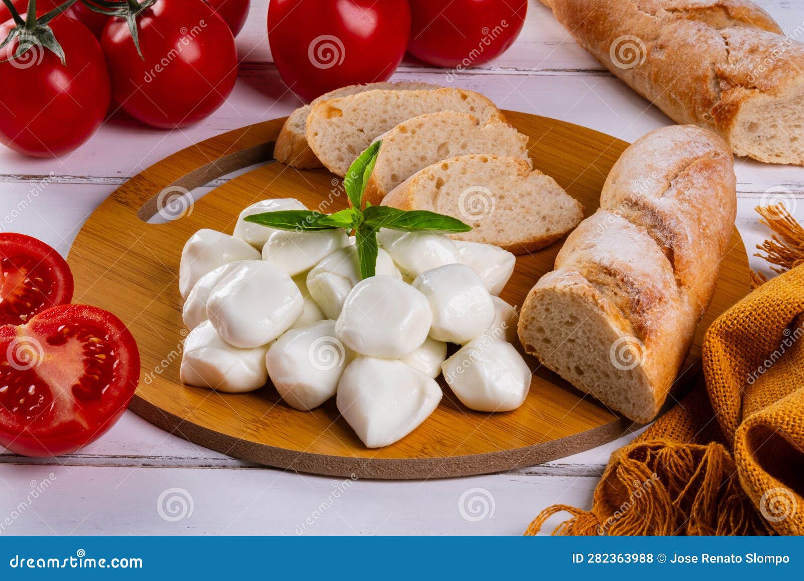 Buffalo Mozzarella Balls, Red Tomatoes and Bread Stock Photo - Image of ...