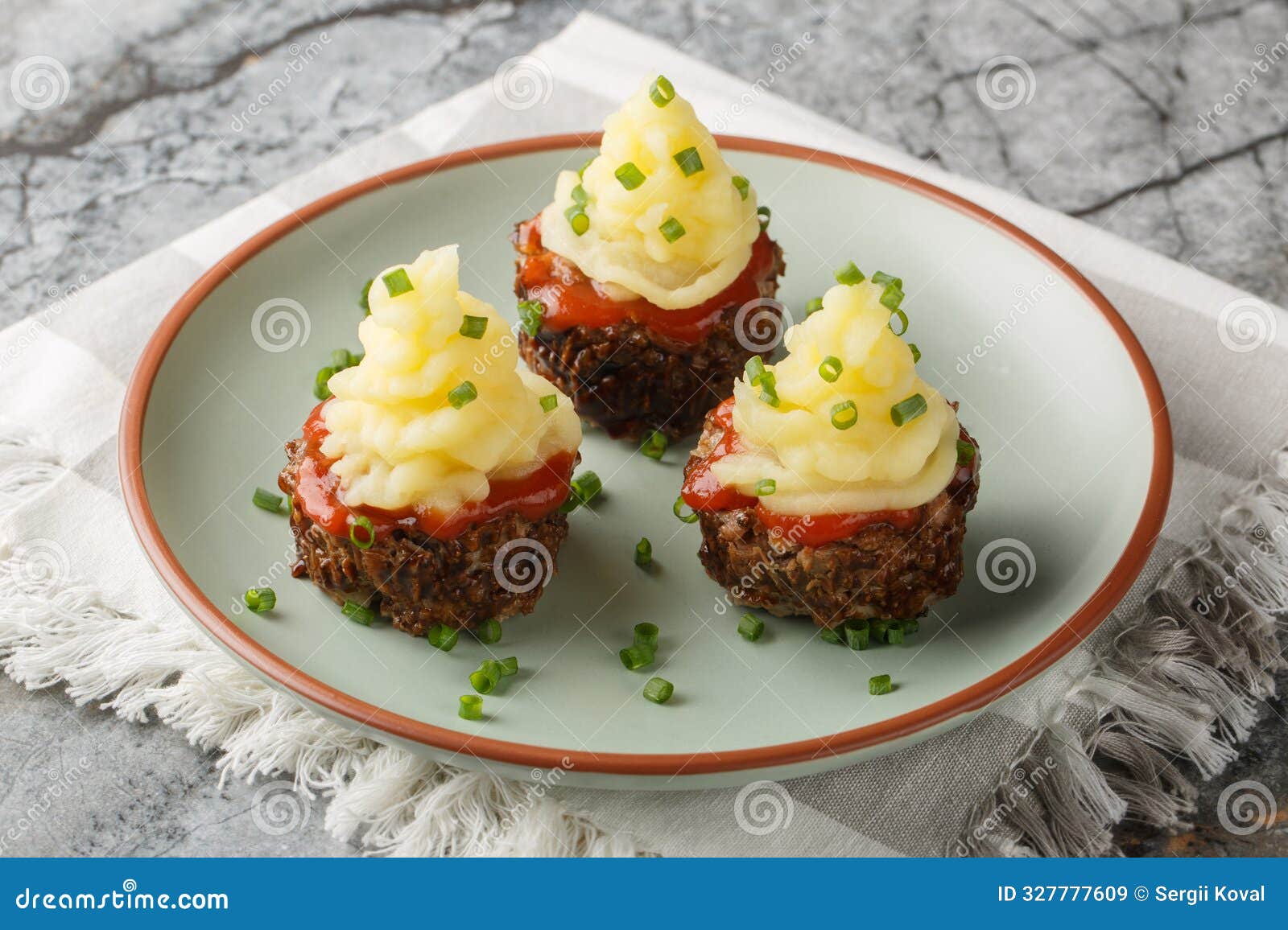Buffet Meat Muffins Topped with Ketchup and Mashed Potatoes Close-up in ...