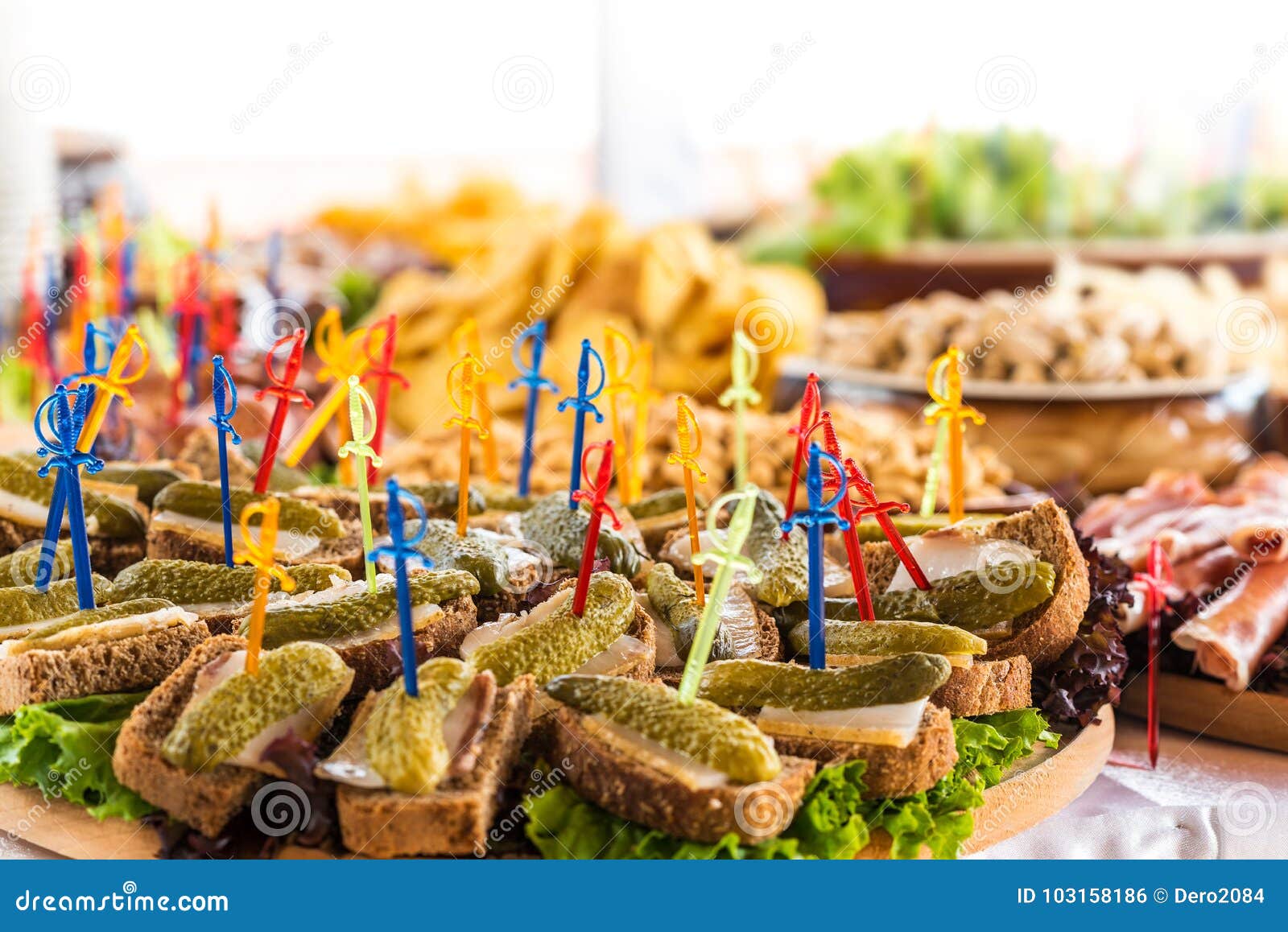 Buffet Table with Canapes of Rye Bread, Lard and Pickled Cucumbers in ...