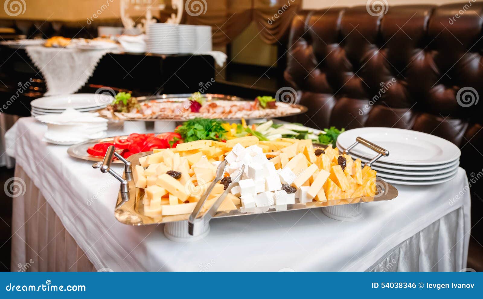 Buffet Table with Cheese Plate Stock Photo - Image of trays, indoor ...
