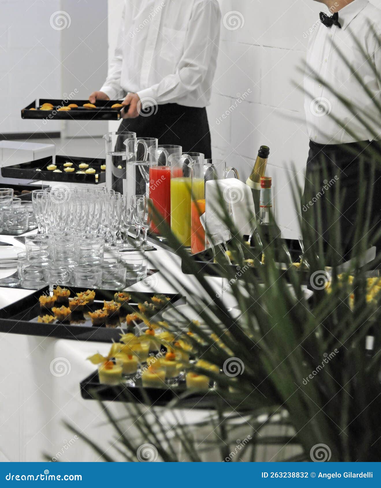 Buffet Table with Two Waiters Waiting for Guests To Arrive Stock Photo ...