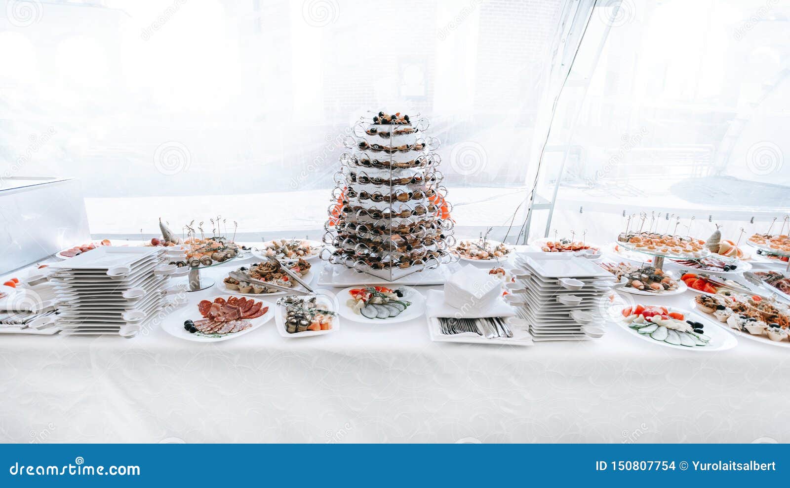 Buffet Table with a Variety of Dishes in the Restaurant Stock Photo ...