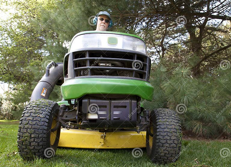 Bug S-Eye View of Man on Riding Lawnmower Stock Photo - Image of aged ...