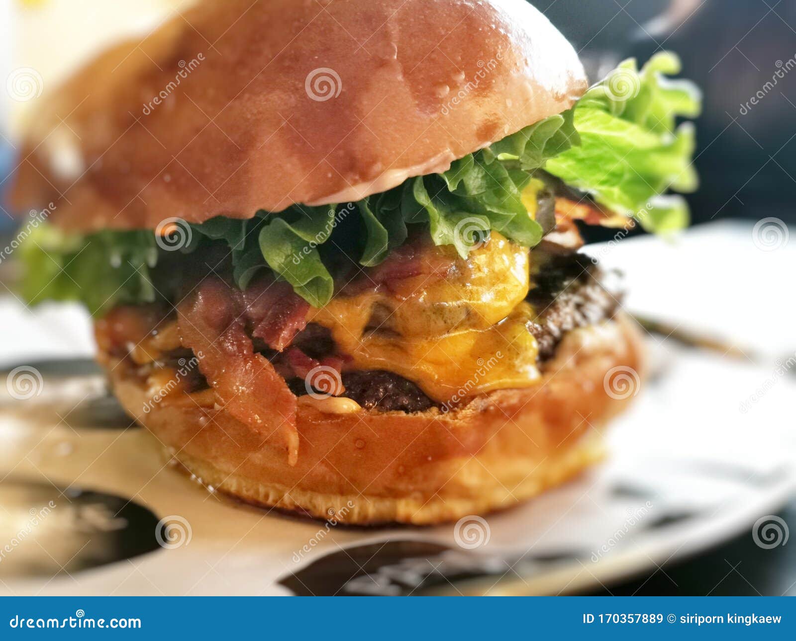 Bugger on table stock image. Image of dinner, onion - 170357889