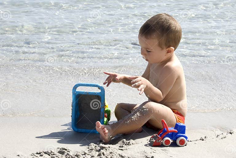 Build on the beach stock photo. Image of hands, enjoying - 6496064