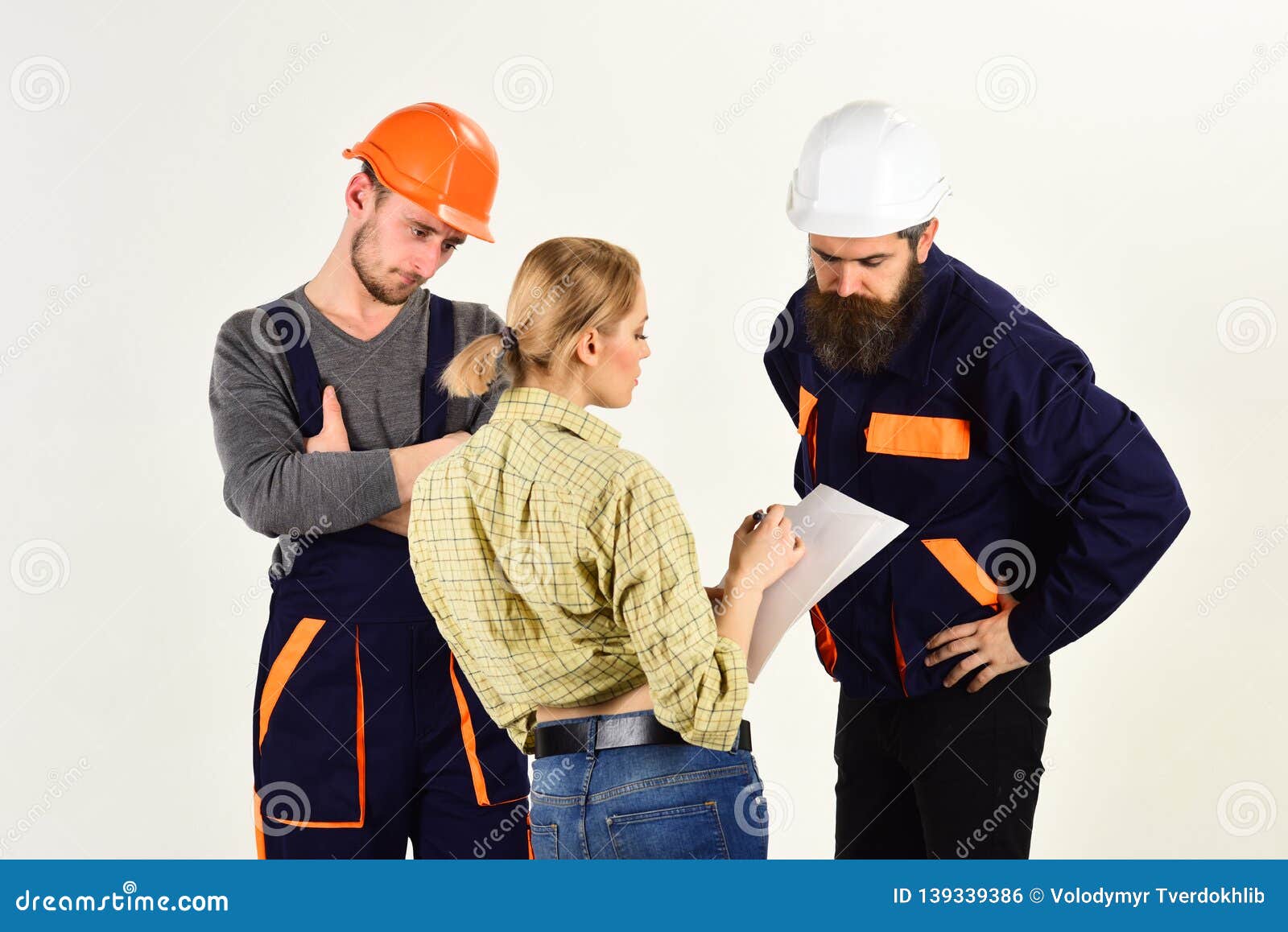 We Build Certainty. Construction Workers Team. Group of Constructing ...