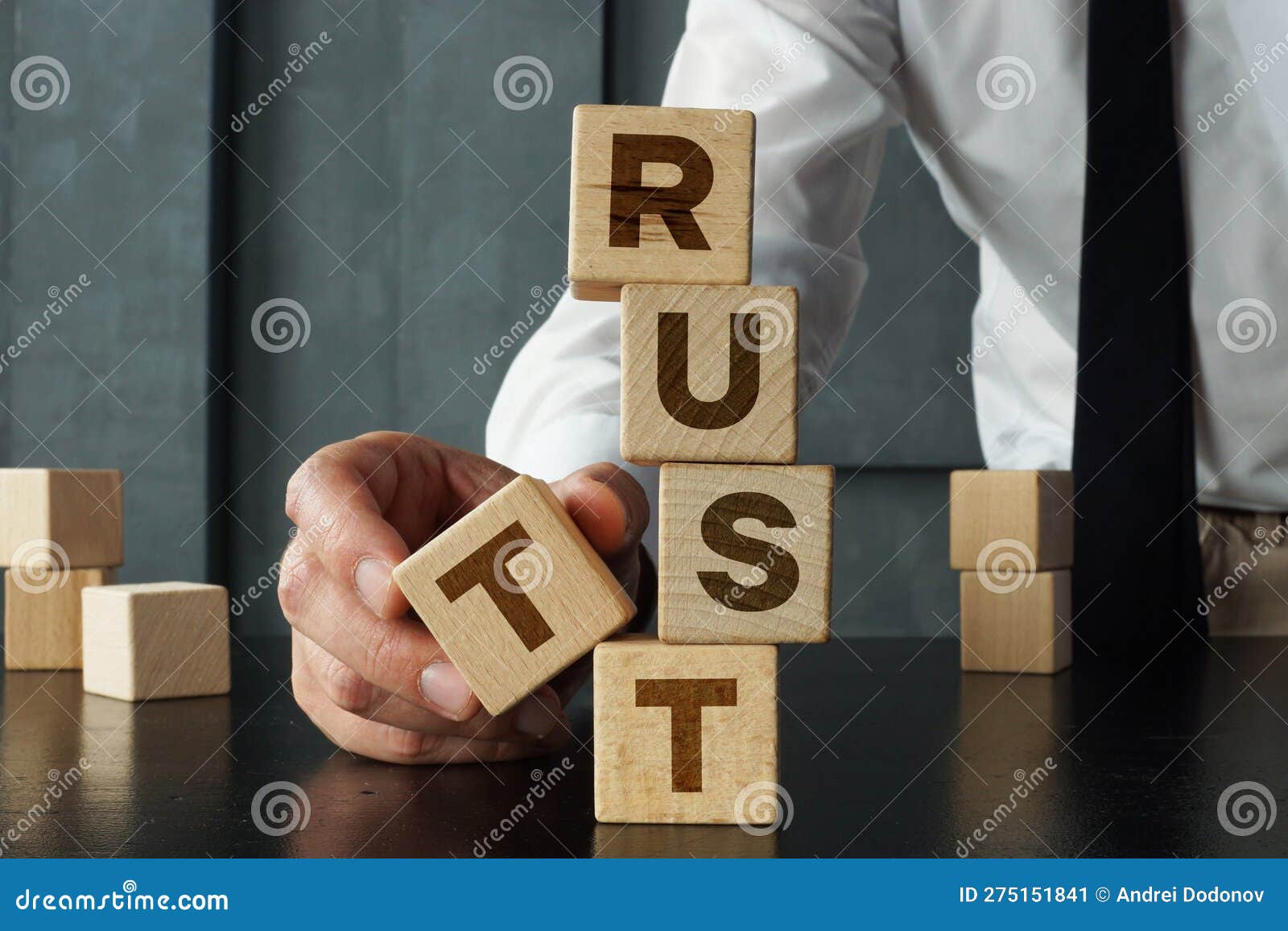 Build Trust Concept is Shown Using the Text. Hand Stacking Wooden ...