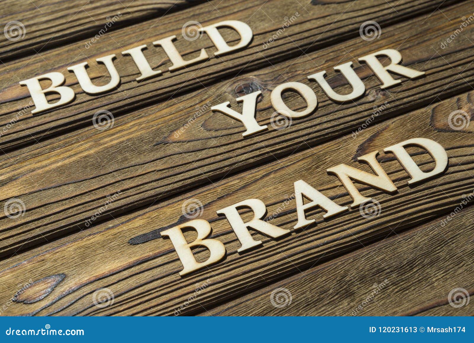 Build Your Brand Text is Composed of Letters on a Wooden Background ... Build Your Brand Text is Composed of Letters on a Wooden Background ...