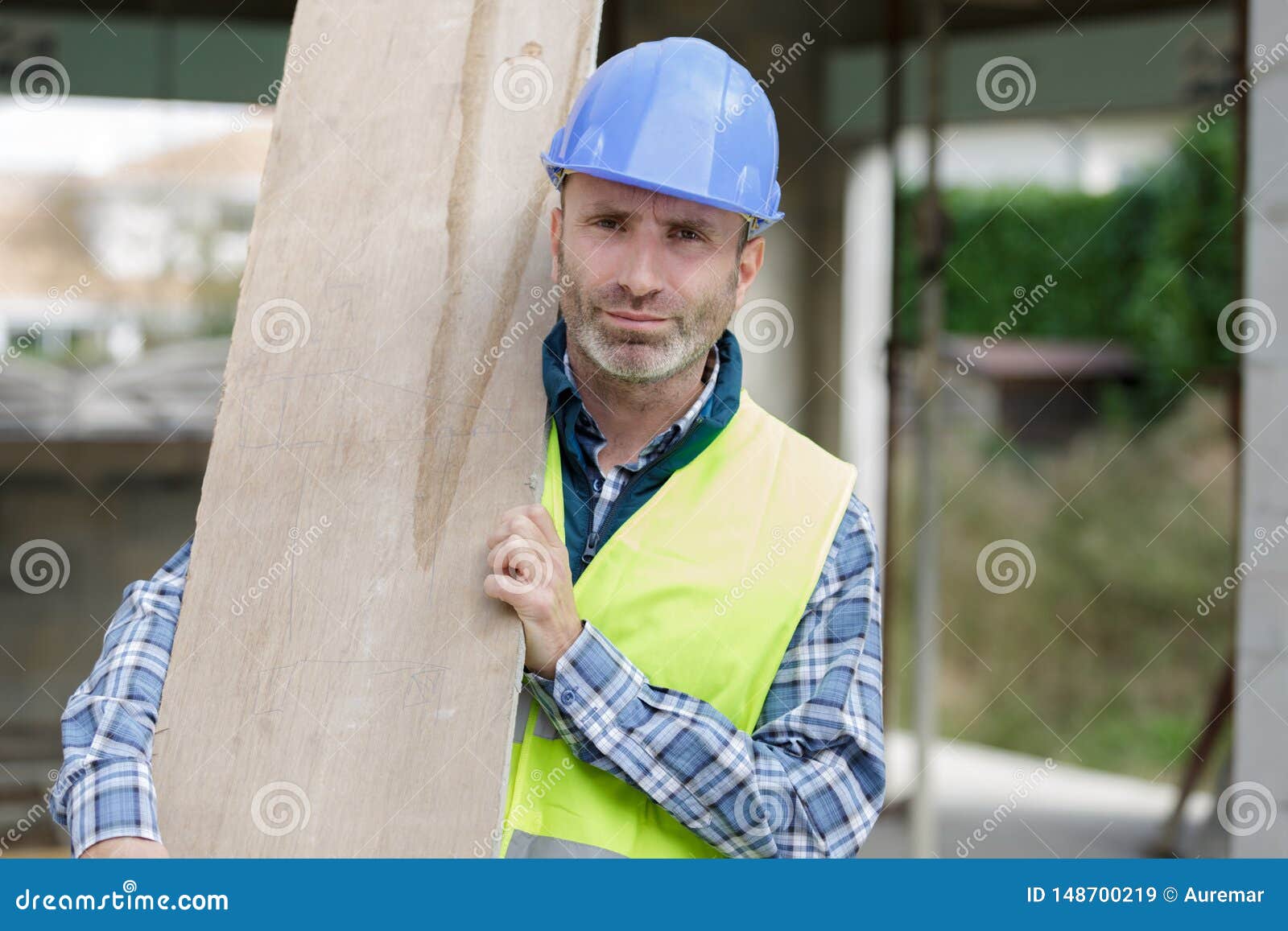 Builder and Apprentice Carrying Wood on Construction Site Stock Image ...