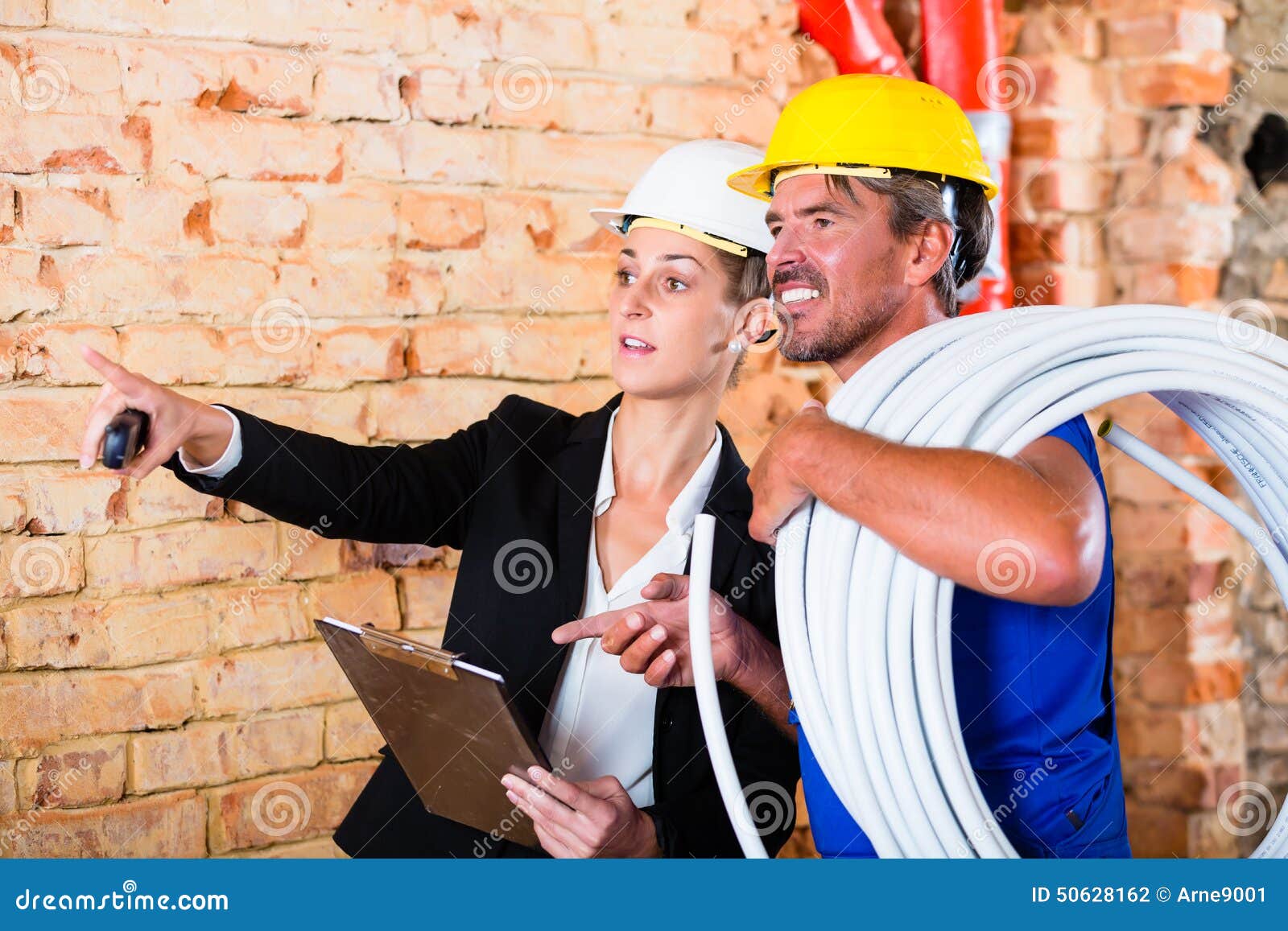 Builder and Architect Working on Construction Site Stock Photo - Image ...