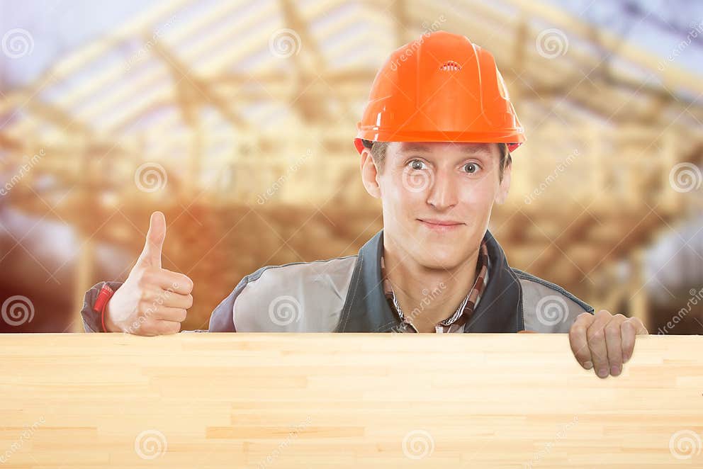 Builder on the Background of the House Stock Photo - Image of services ...