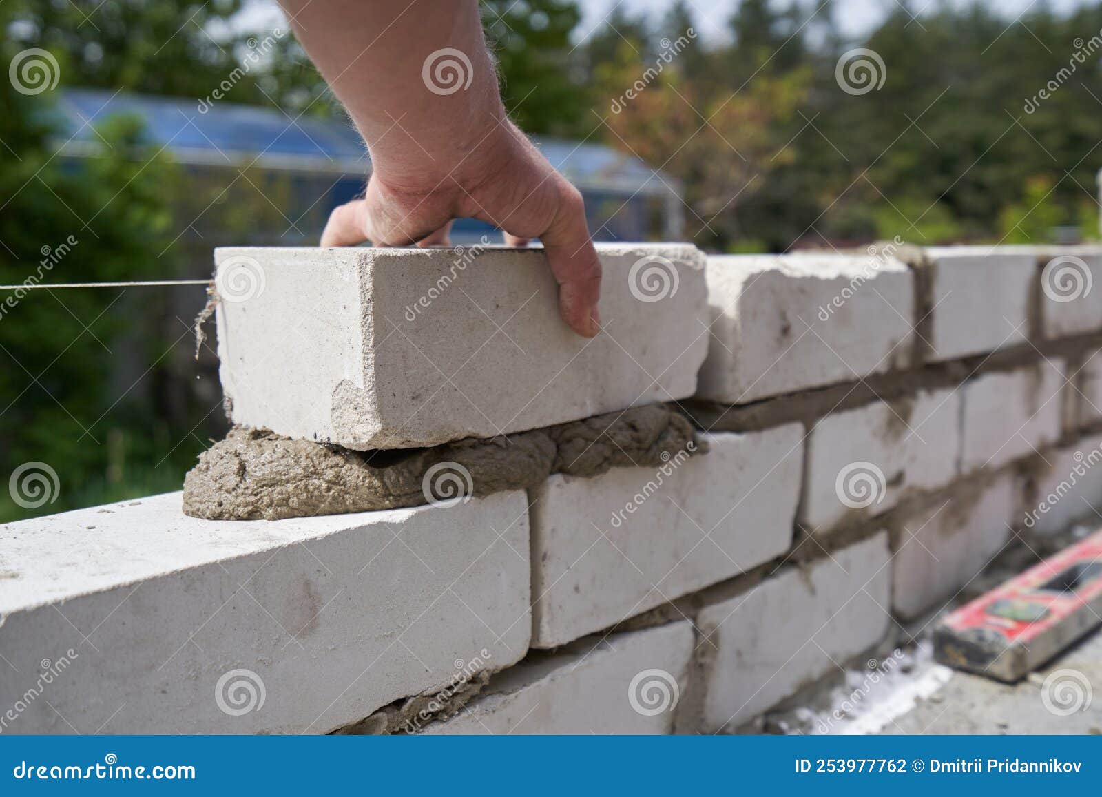 Builder Bricklayer Builds Walls from Bricks, Close-up Stock Photo ...