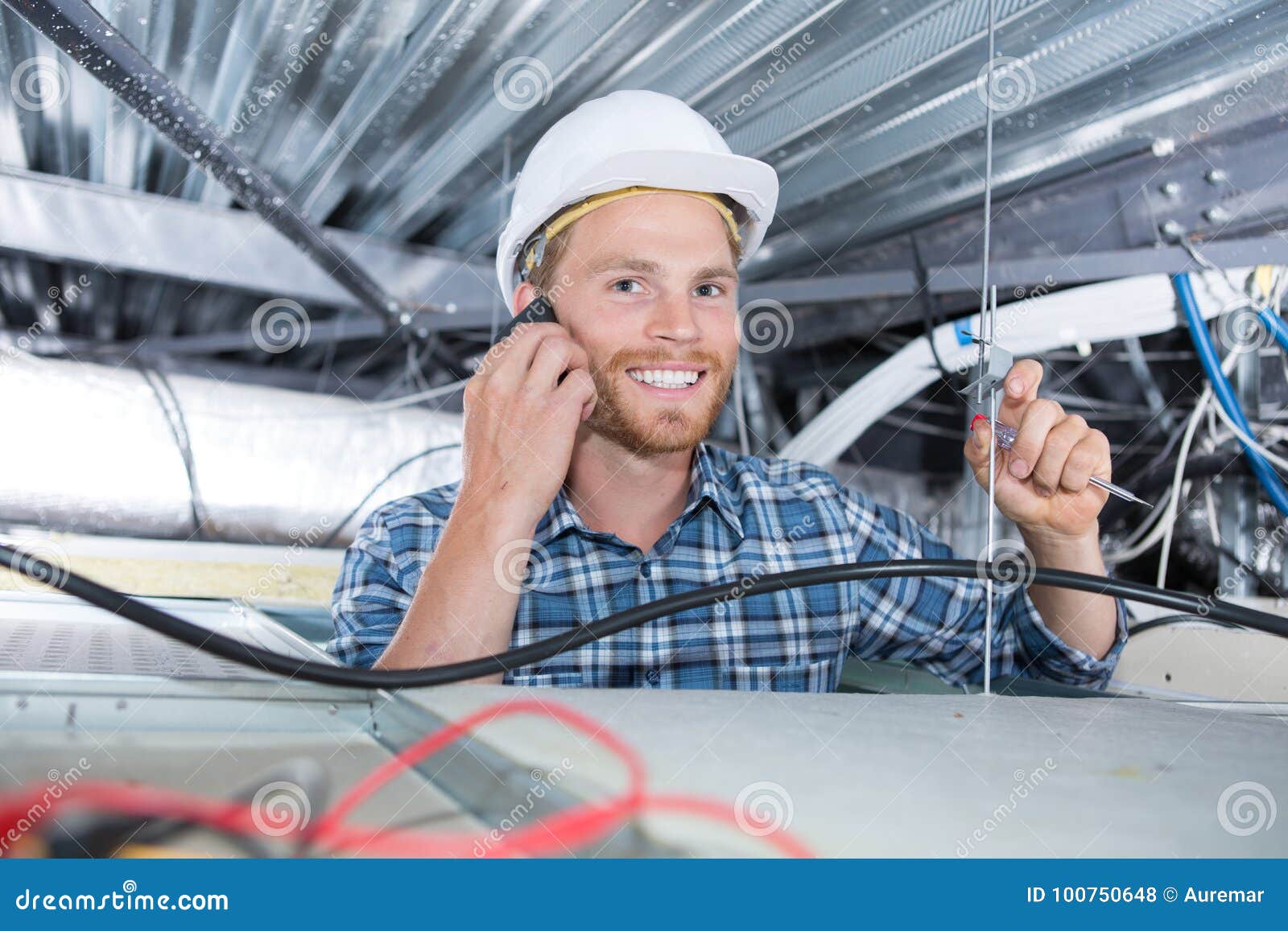 Builder Calling Plumber while Fixing Ceiling Stock Photo - Image of ...