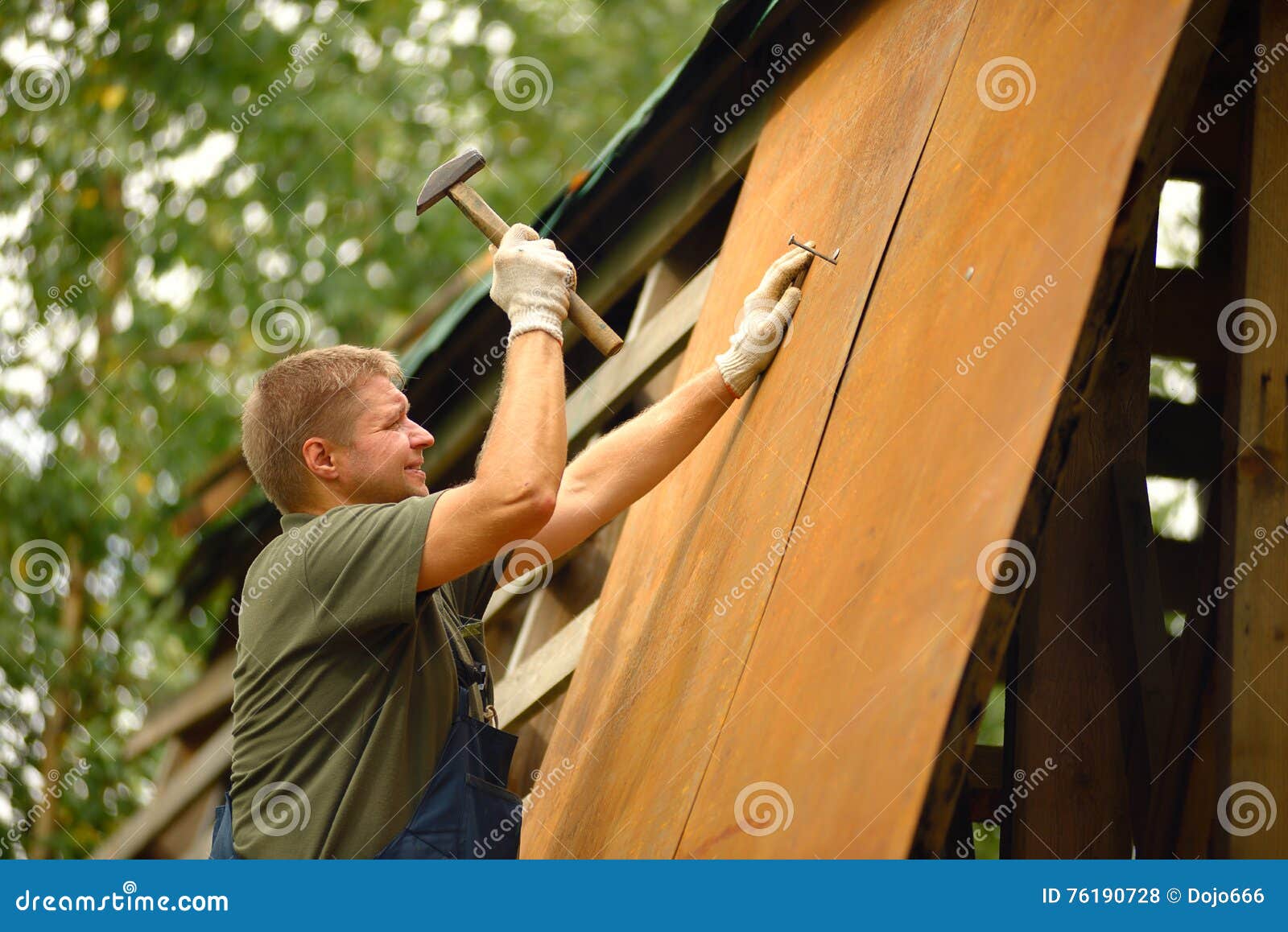 Builder or Carpenter Working and Builds a Roof Stock Photo - Image of ...