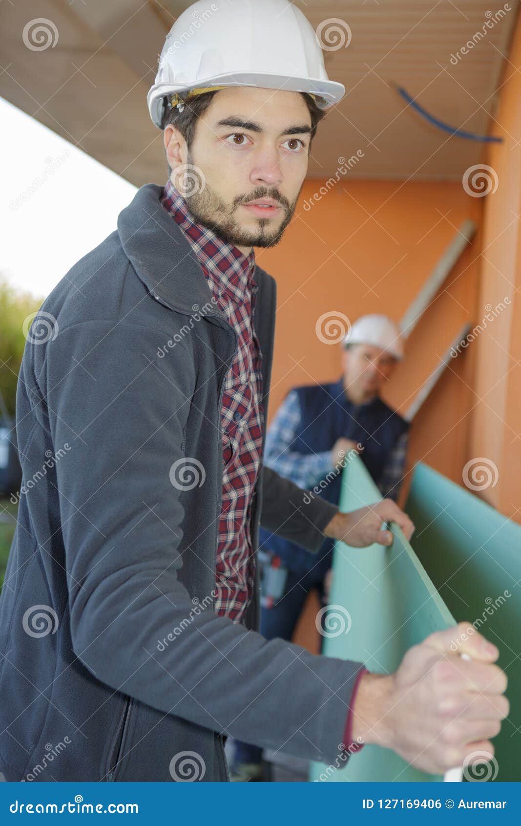 Builder Carrying Plaster Boards Stock Photo - Image of compressed ...