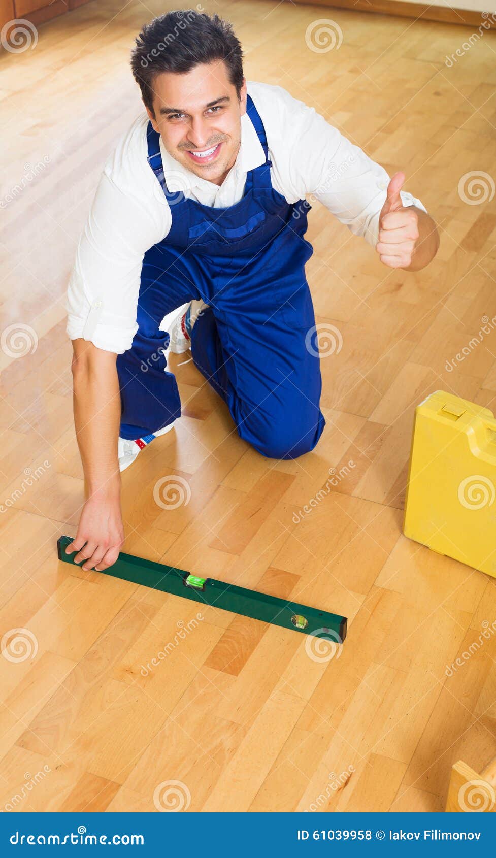 Builder Checking Floor with Level Stock Photo - Image of adult ...