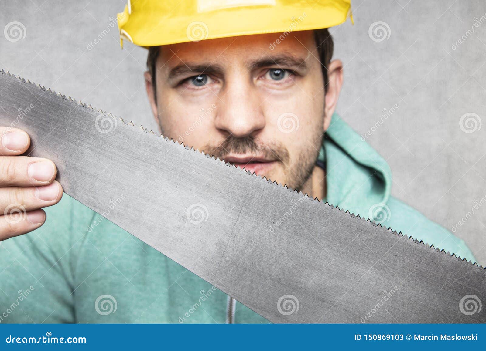 The Builder Checks If the Saw is Straight and Sharp Stock Image - Image ...