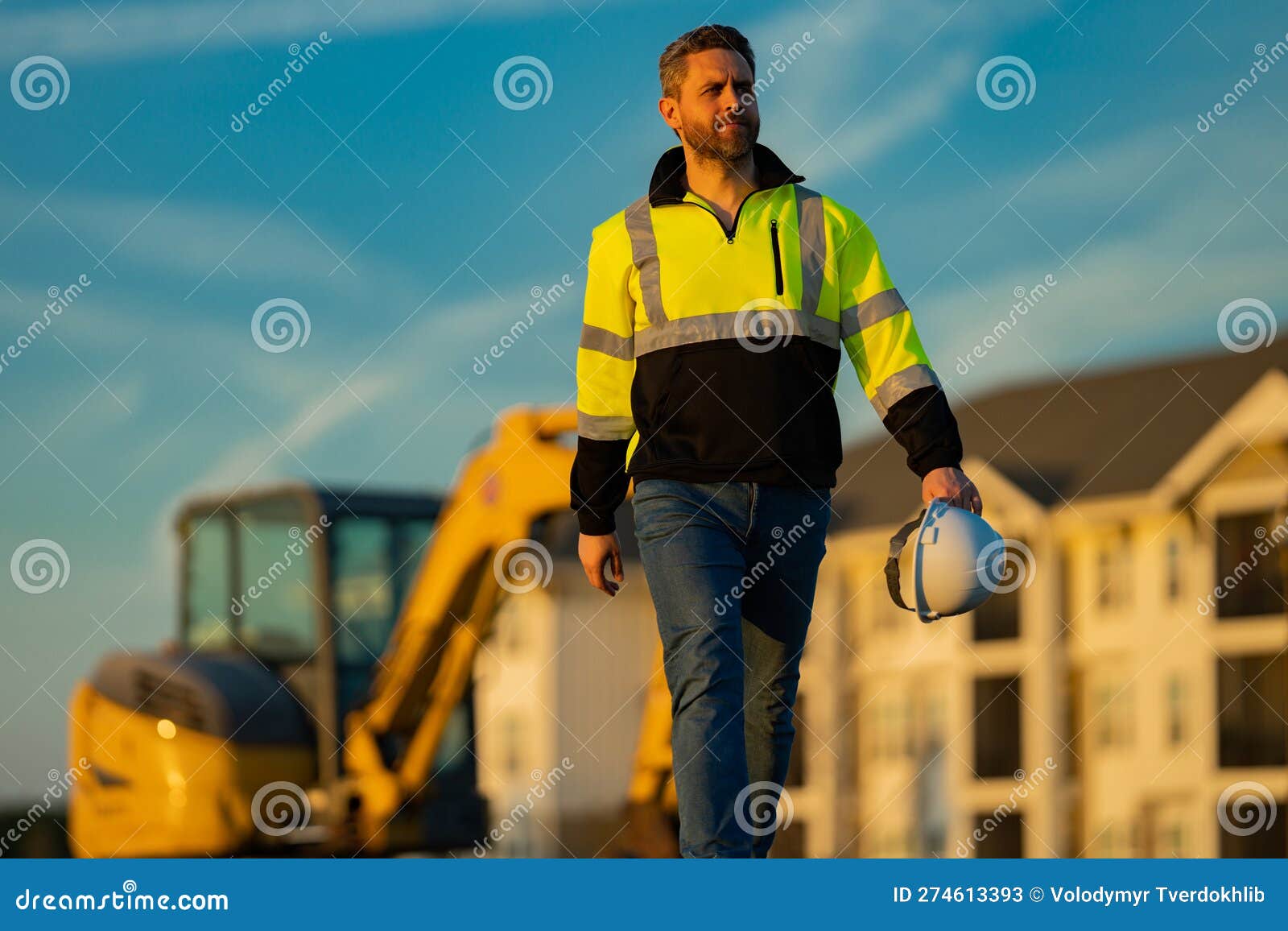 Builder in a Construction Site. Builder with Excavator Ready To Build ...