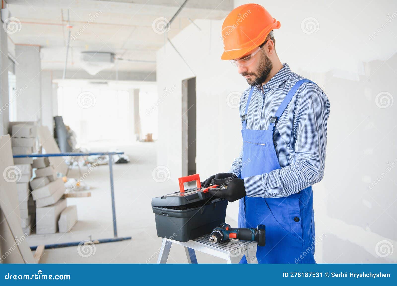 Builder on Construction Site with Tool Box Stock Image - Image of hand ...