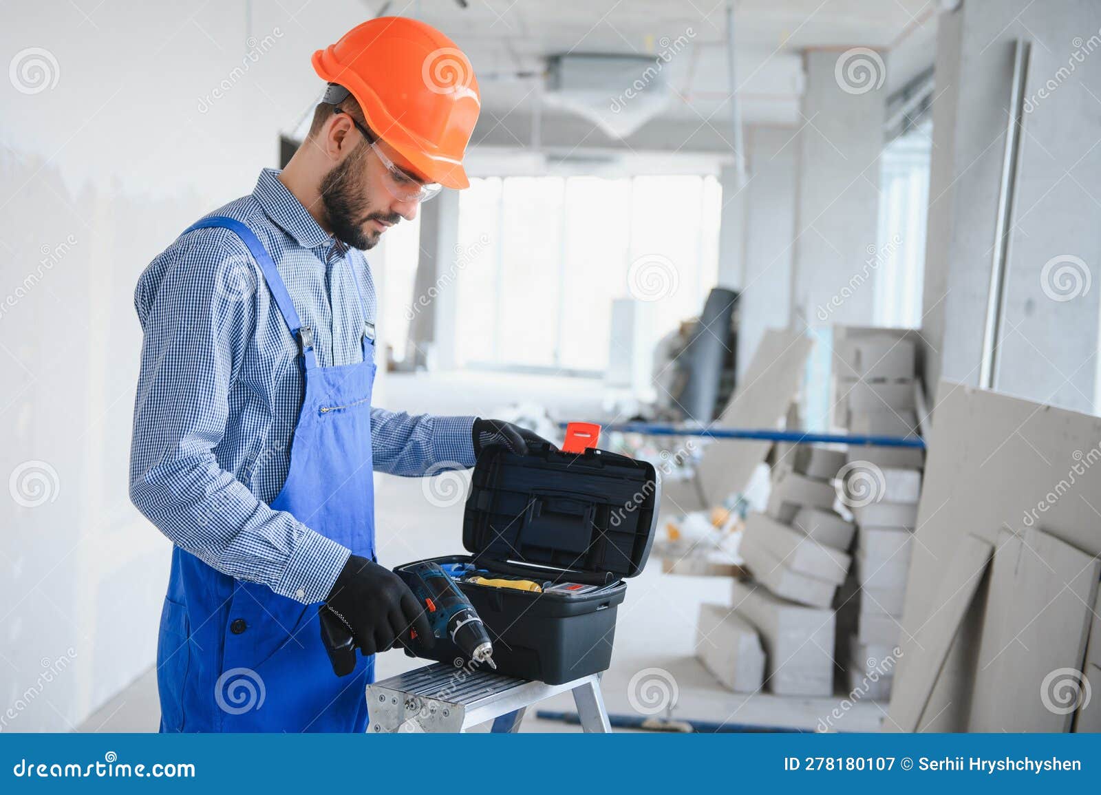 Builder on Construction Site with Tool Box Stock Image - Image of male ...