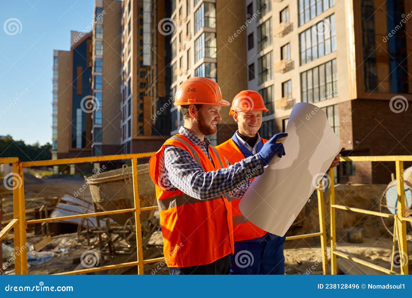 Builder Contractor and Engineer Architect Discussing Blueprint Stock ...