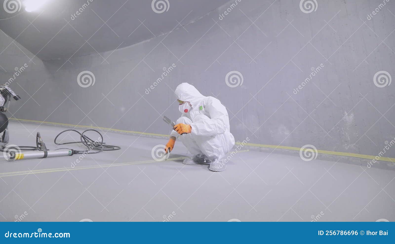 The Builder Covers the Joint Seam with Sealant. Construction Worker ...