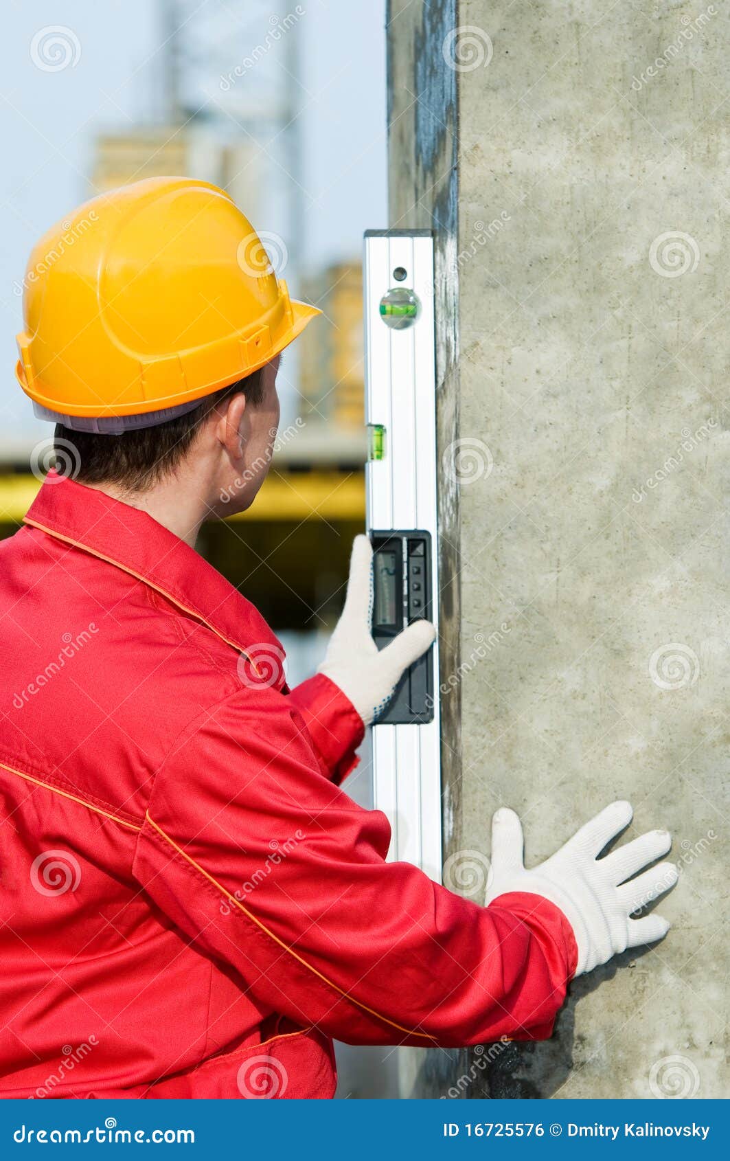 Builder with digital level stock photo. Image of industry - 16725576