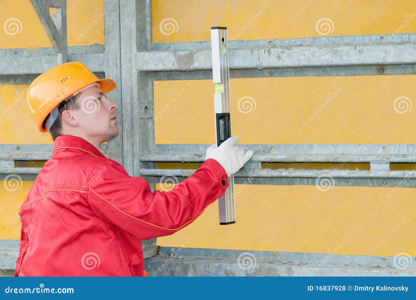 Builder with digital level stock photo. Image of professional - 16837928