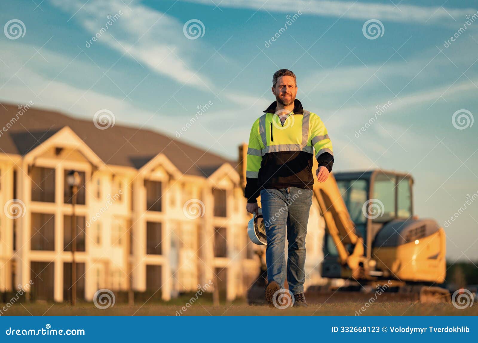 Builder with Excavator for Construction at the Construction Site ...