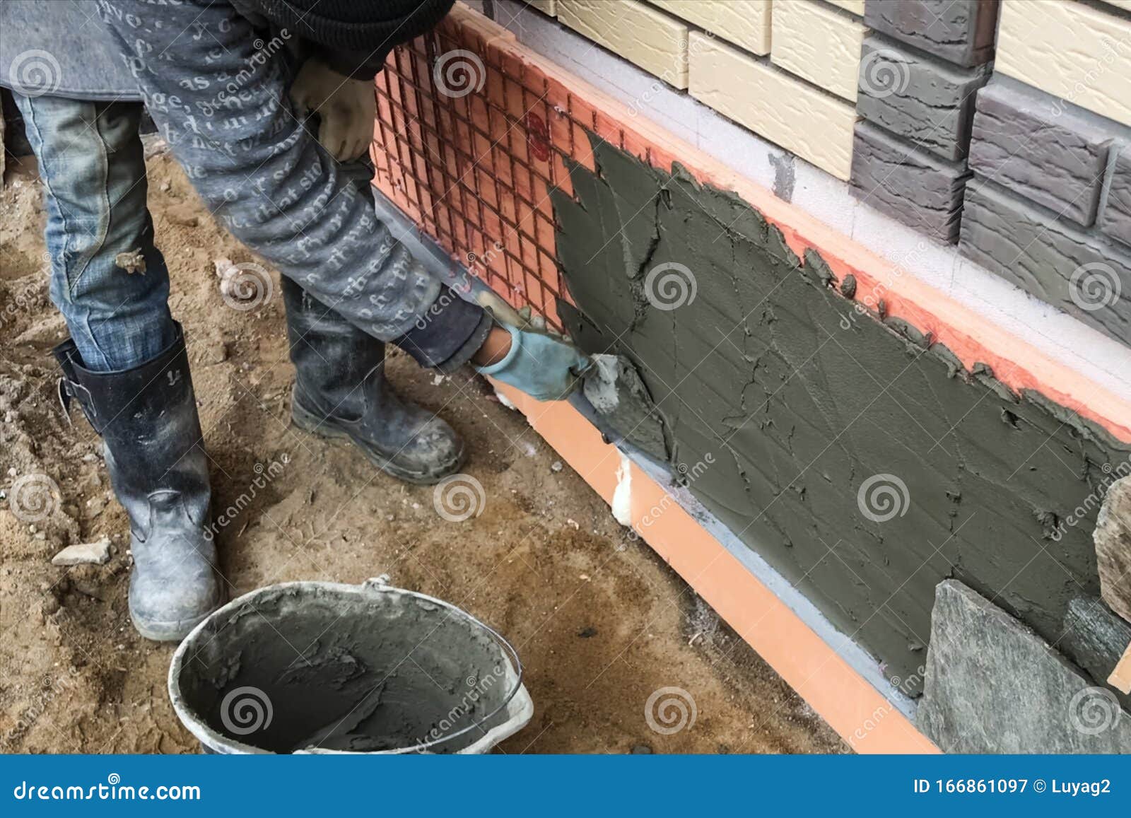 Builder Faces the Basement of a House with a Wild Stone. Flat for ...