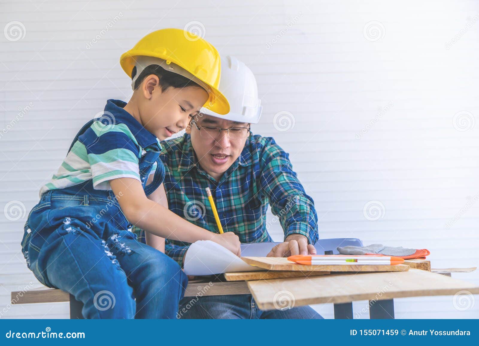 Builder Father Talking To His Son For Future Career And Teaching ...