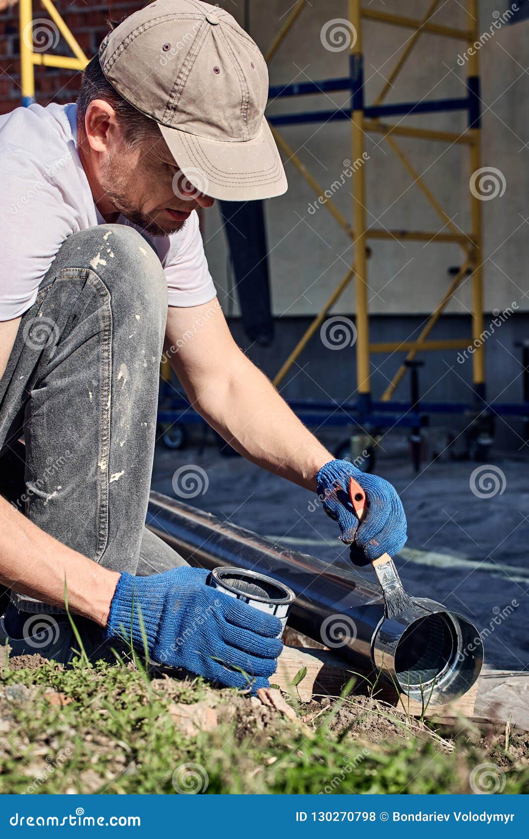 Builder at the Finish House Working with the Tool. Stock Photo - Image ...