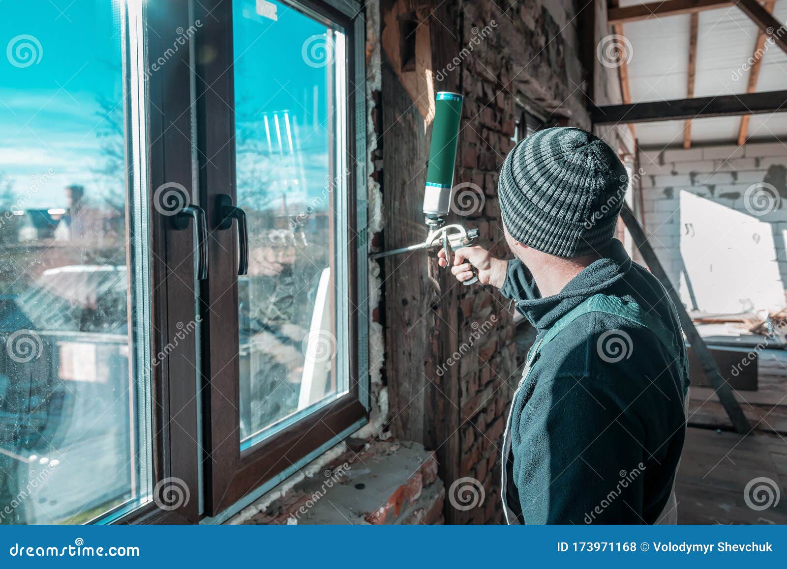 The Builder Fixes Window with Polyurethane Foam Stock Photo - Image of ...