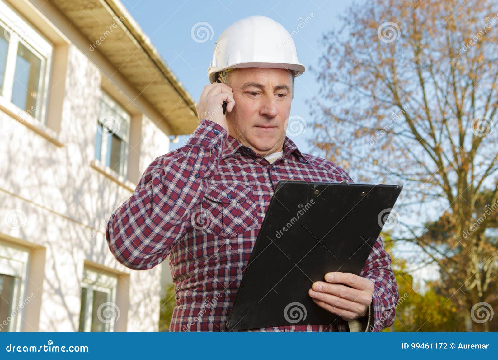 Builder Foreman Making Call Stock Photo - Image of hard, worker: 99461172
