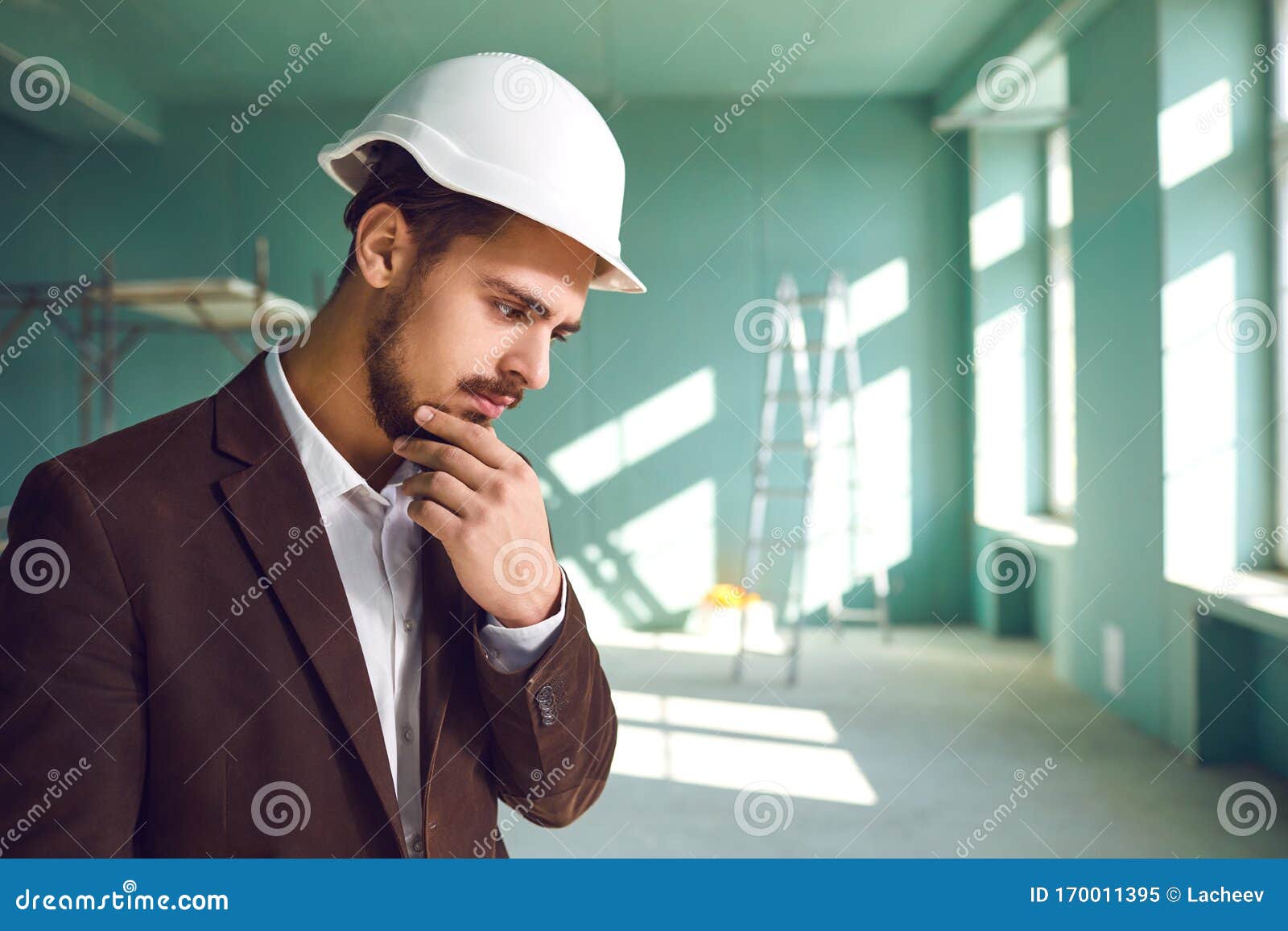 Builder Foreman in a White Helmet Surprised in Shock at a Construction ...