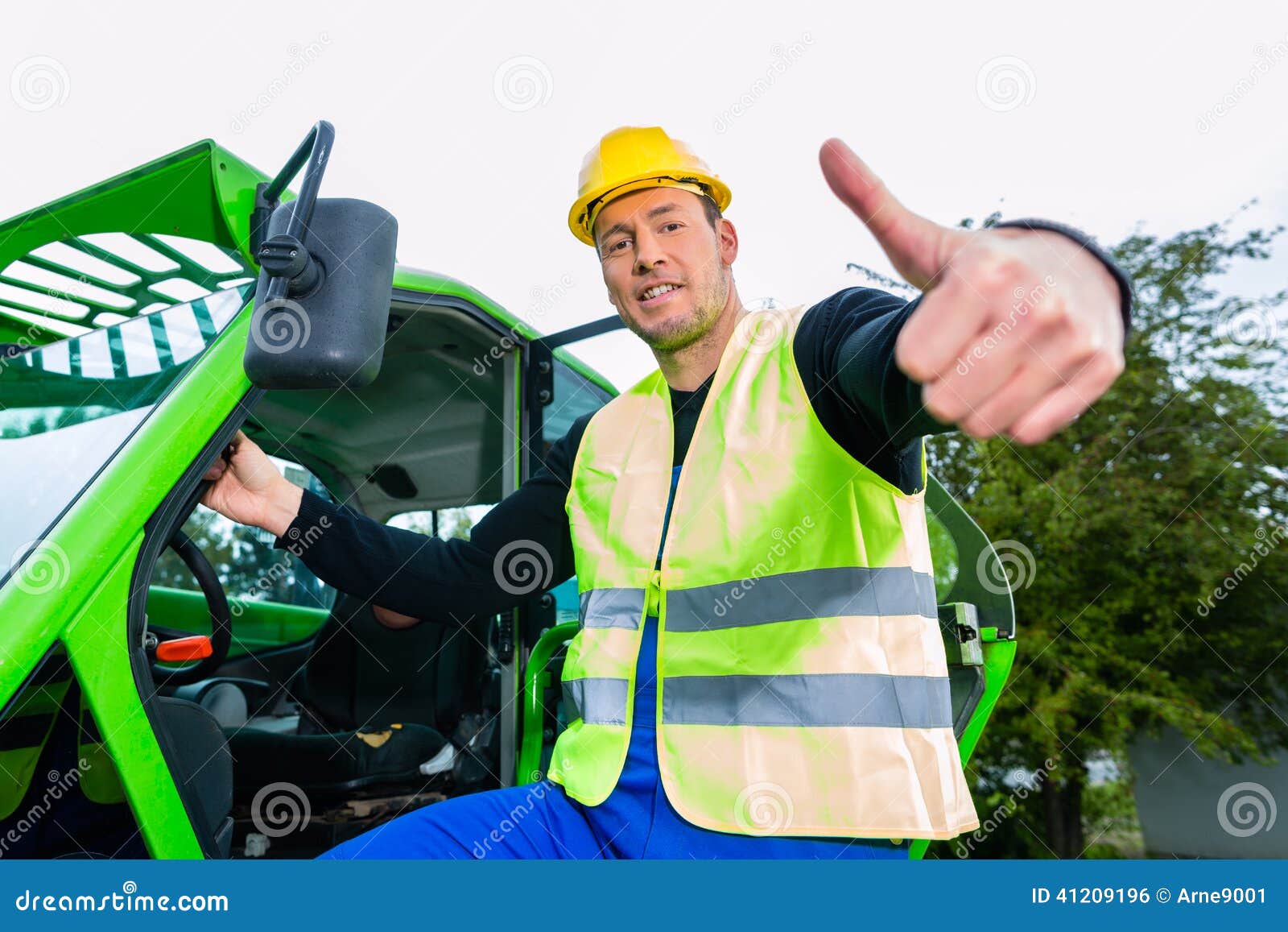 Builder in Front of Construction Machinery Stock Photo - Image of ...