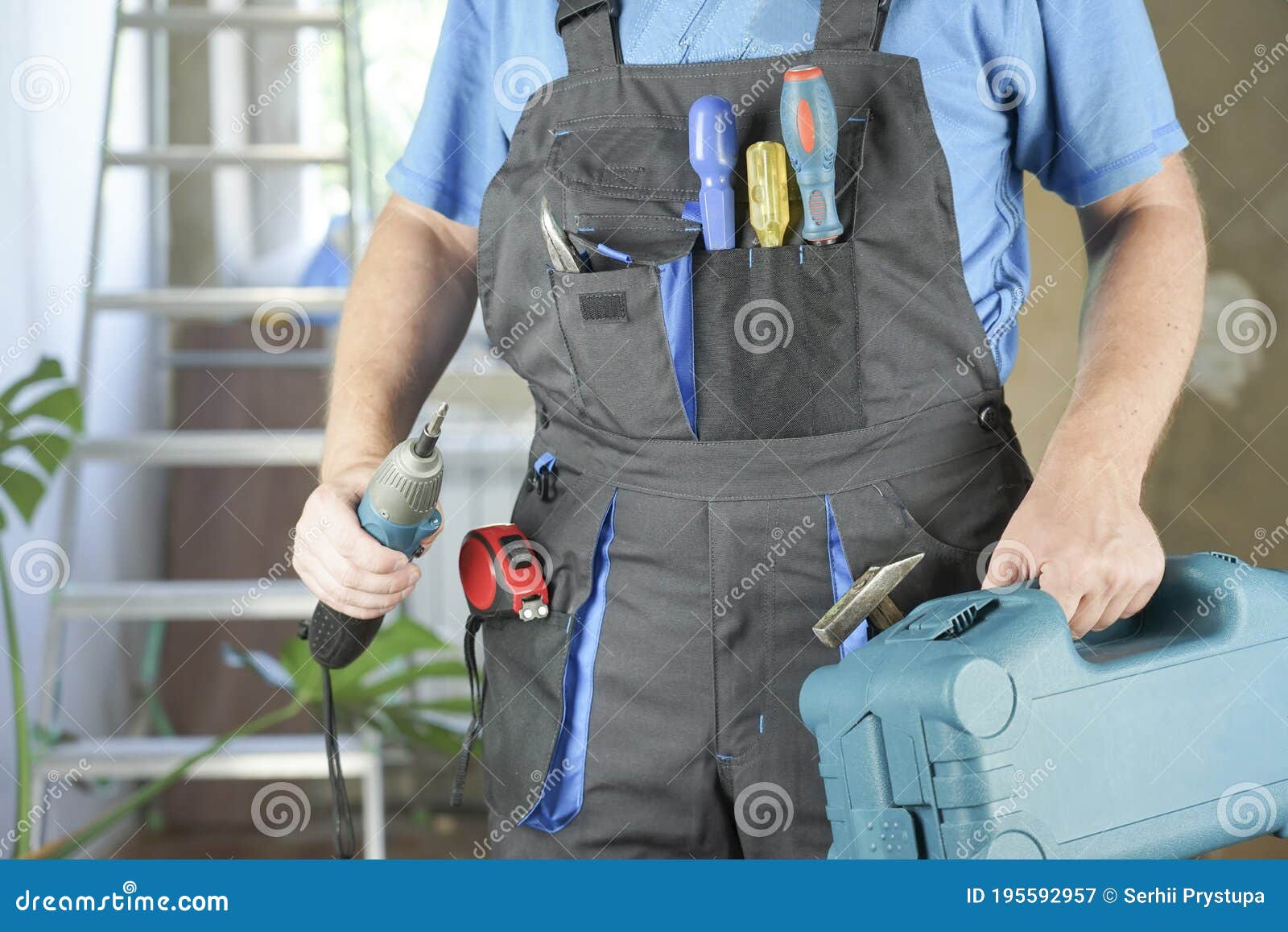 Builder Guy Holds a Toolbox and a Cordless Screwdriver Stock Image ...