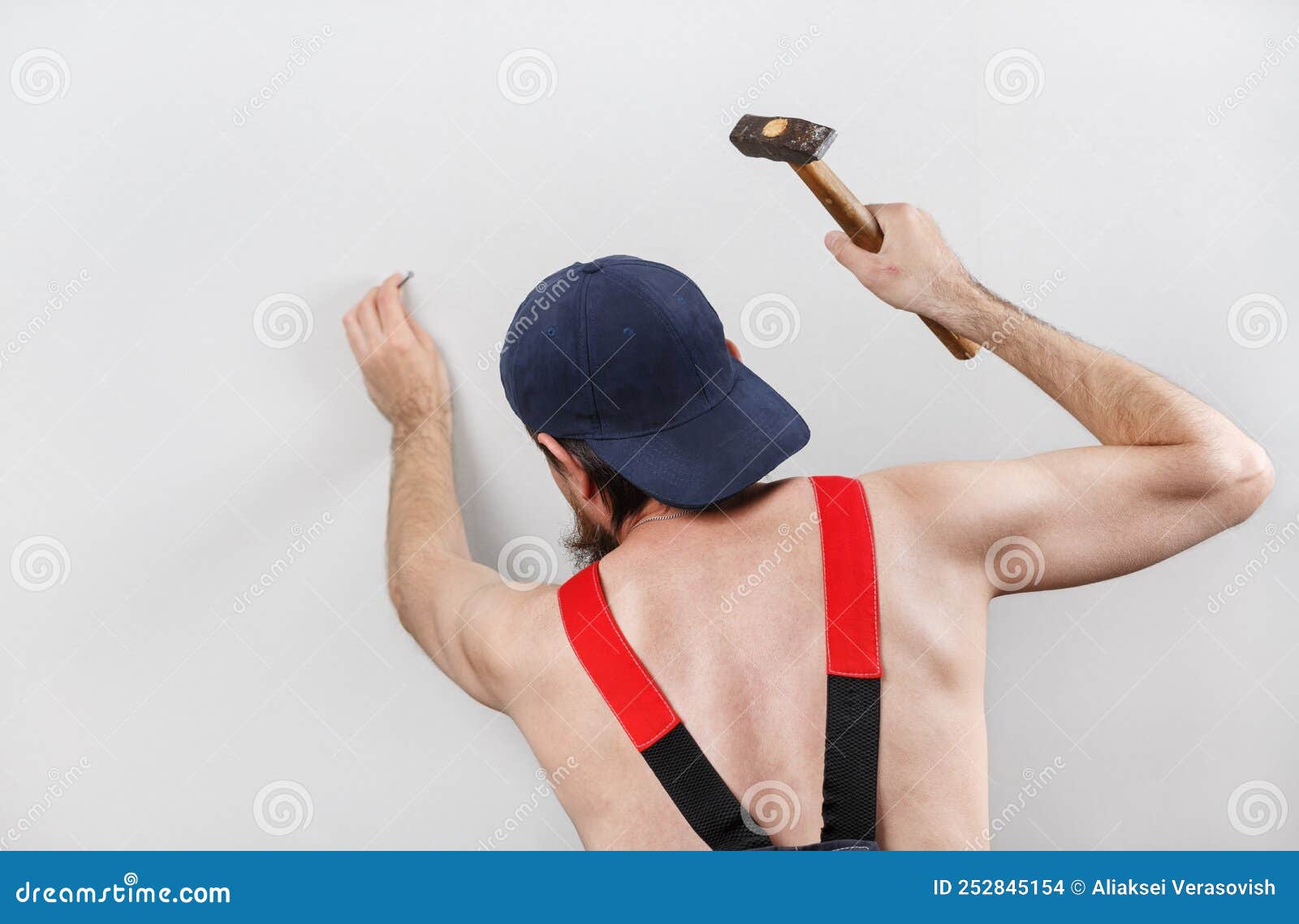 Builder with hammer stock photo. Image of concept, casual - 252845154