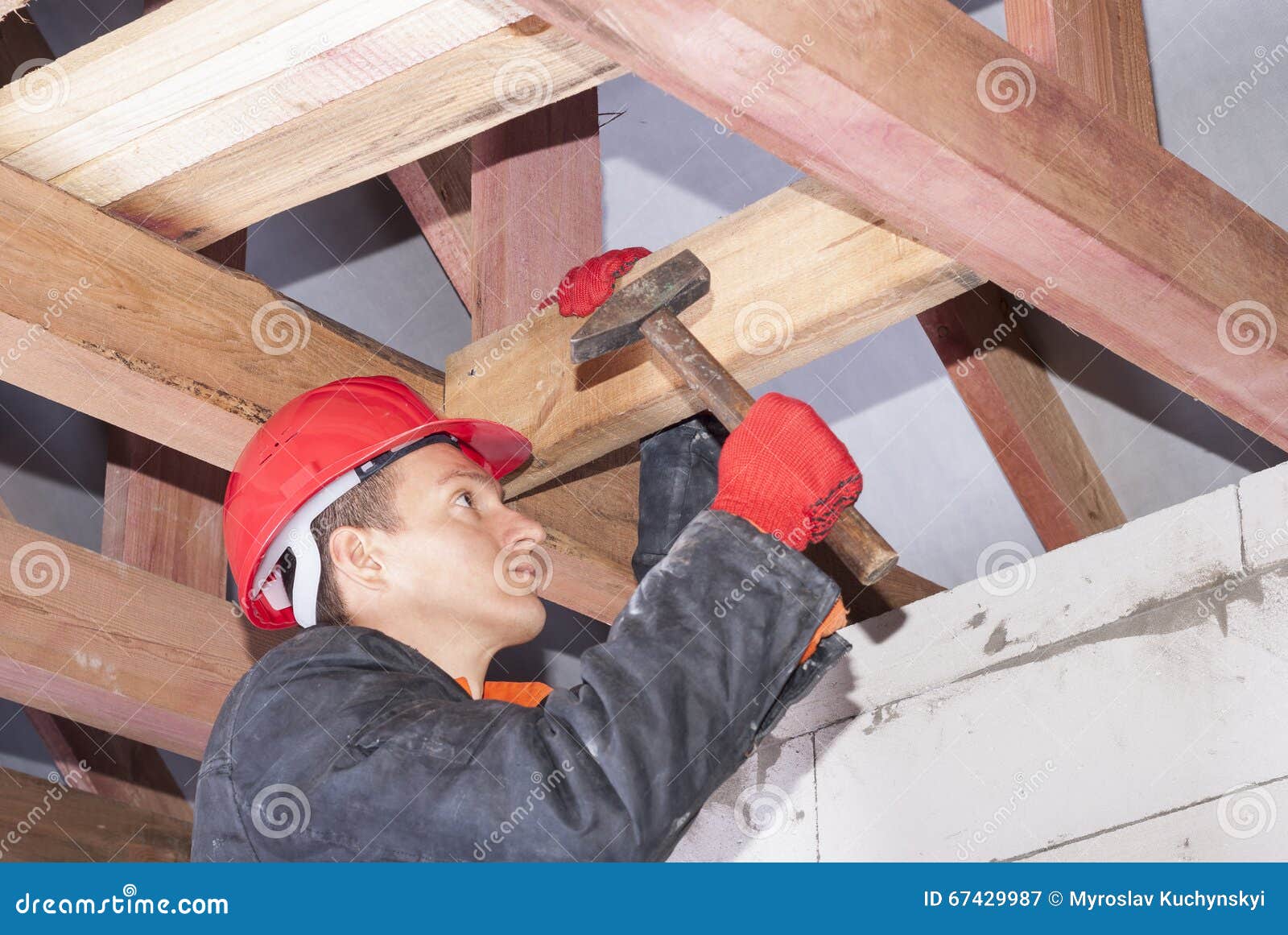 Builder hammers a nail stock image. Image of home, tools - 67429987