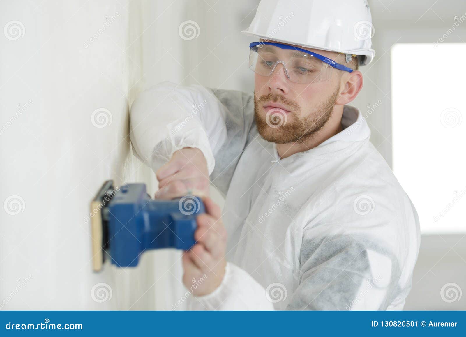 Builder Hand Sanding Interior Wall for Restoration Stock Image - Image ...