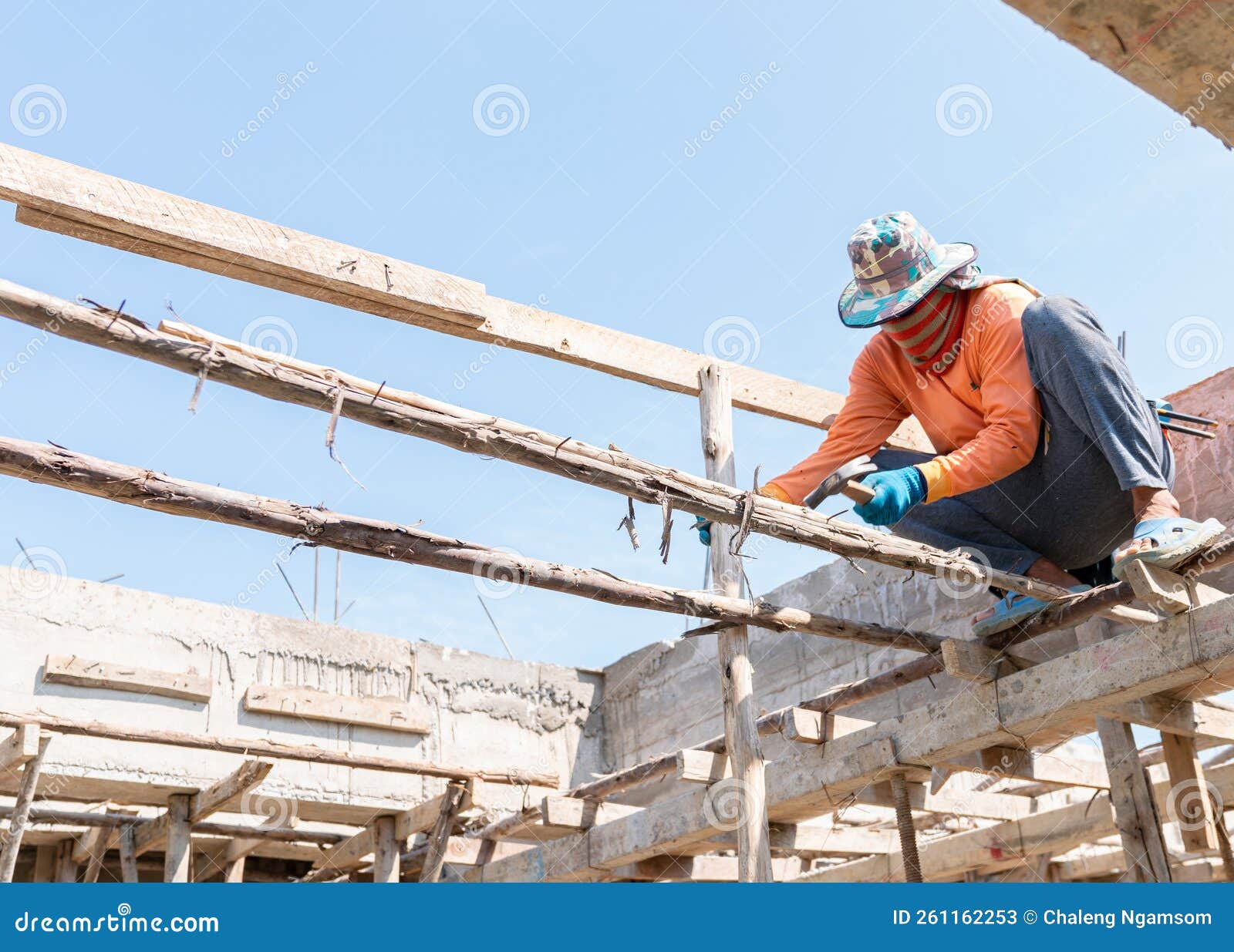 Builder Hands Hammering a Nail into a Formwork Support Second Floor ...