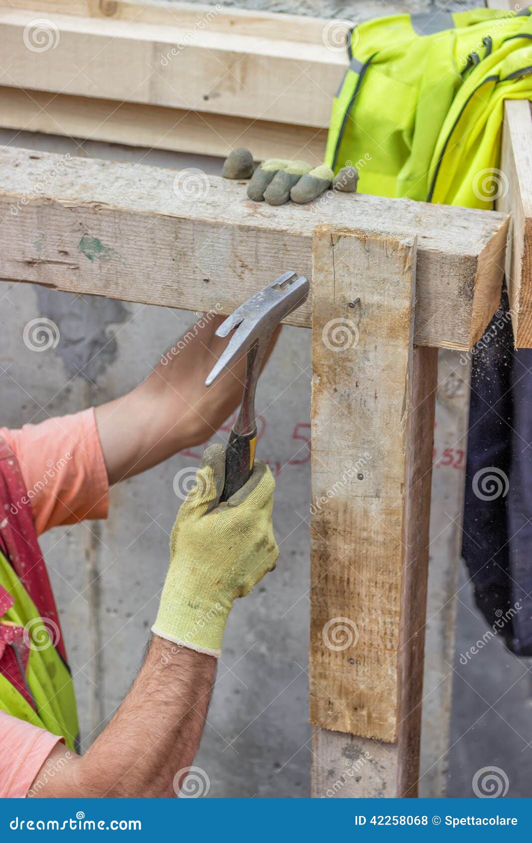 Builder Hands Hammering a Nail into a Plank 4 Stock Photo - Image of ...