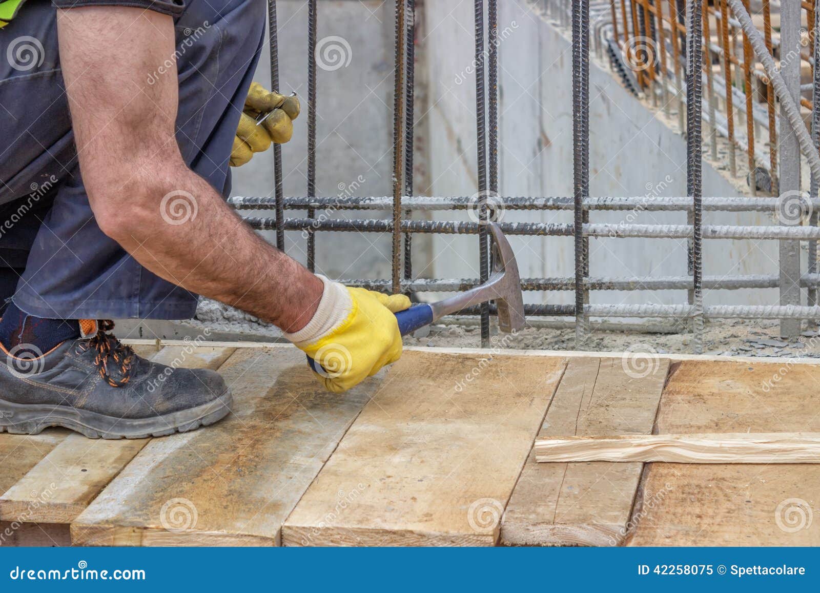 Builder Hands Hammering a Nail into a Plank 3 Stock Image - Image of ...