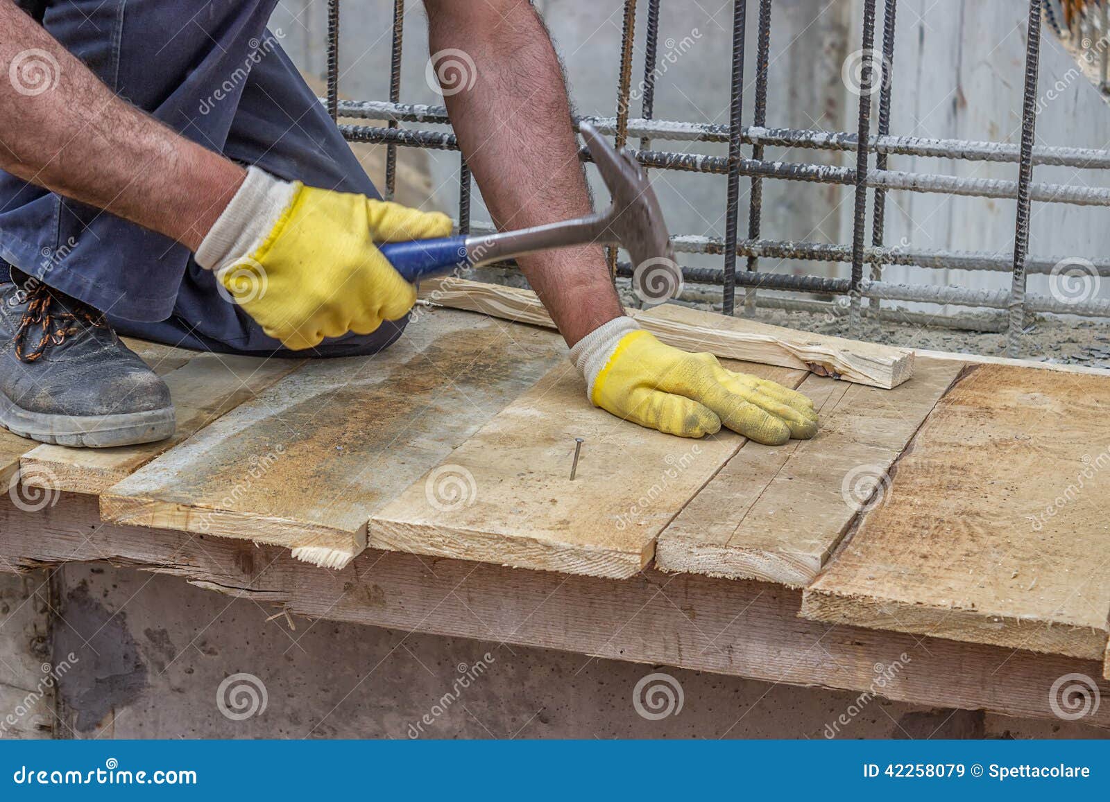 Builder Hands Hammering a Nail into a Plank 2 Stock Image - Image of ...