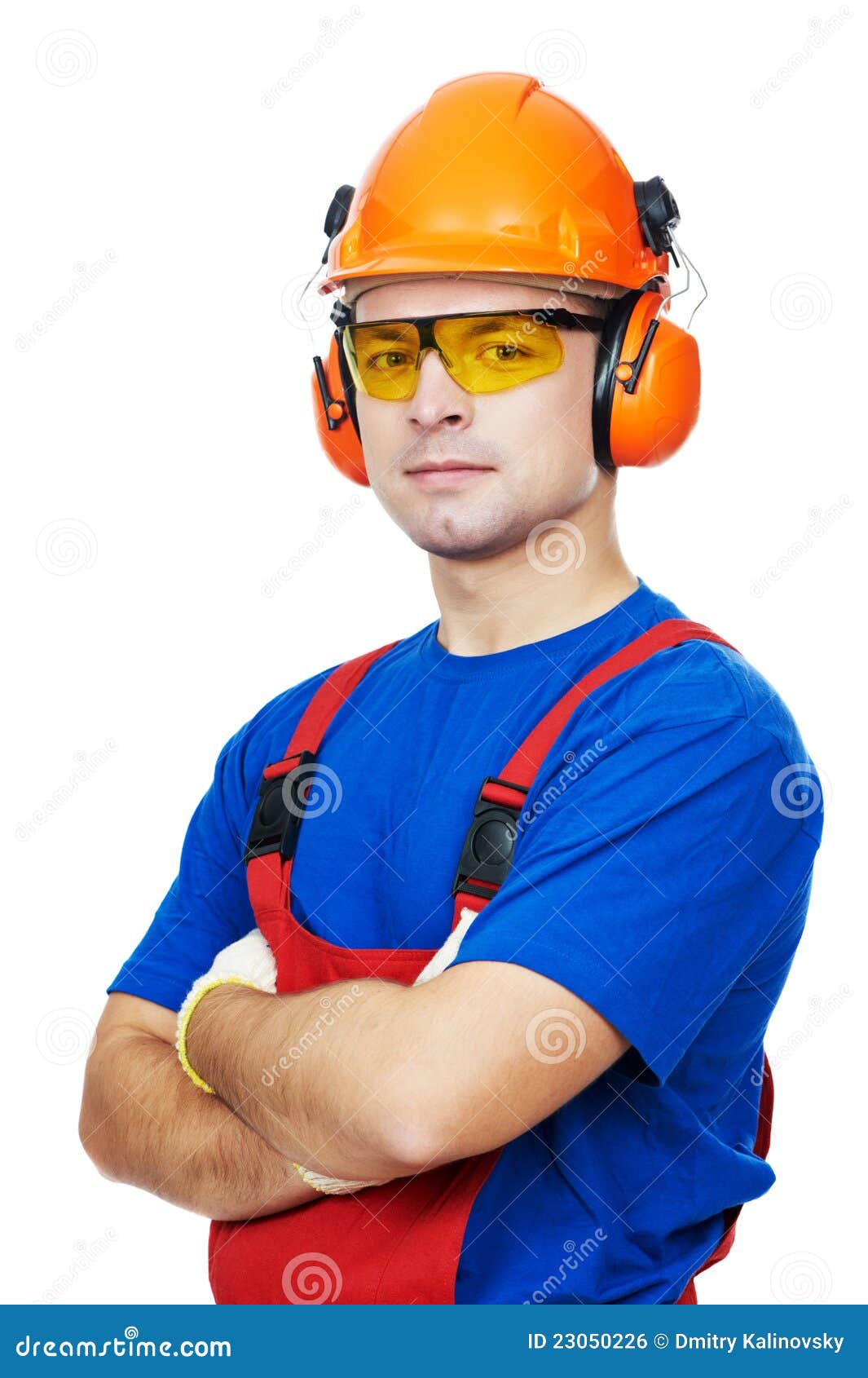 Builder in Hard Hat, Earmuffs and Goggles Stock Photo - Image of ...