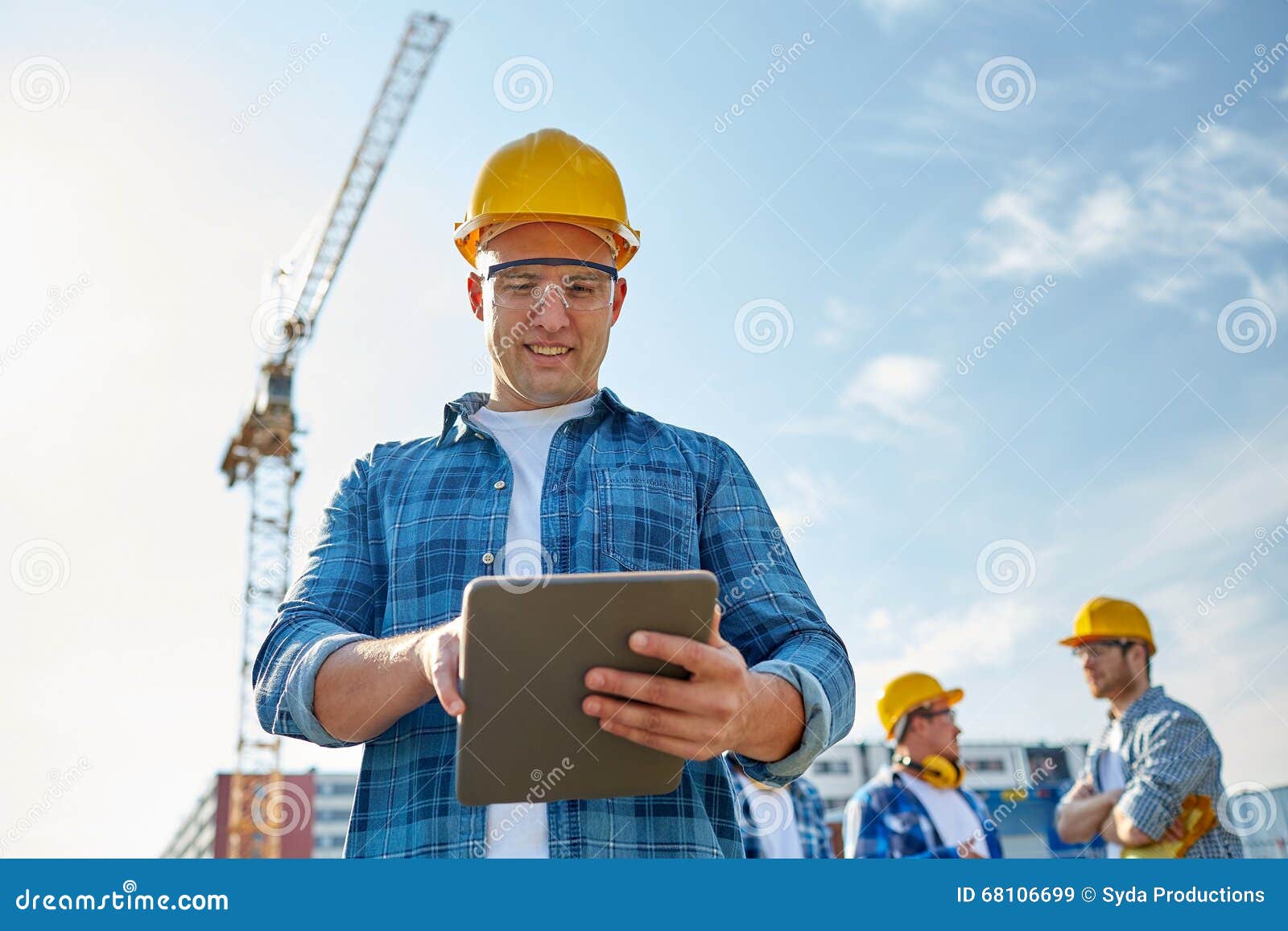 Builder in Hardhat with Tablet Pc at Construction Stock Image - Image ...