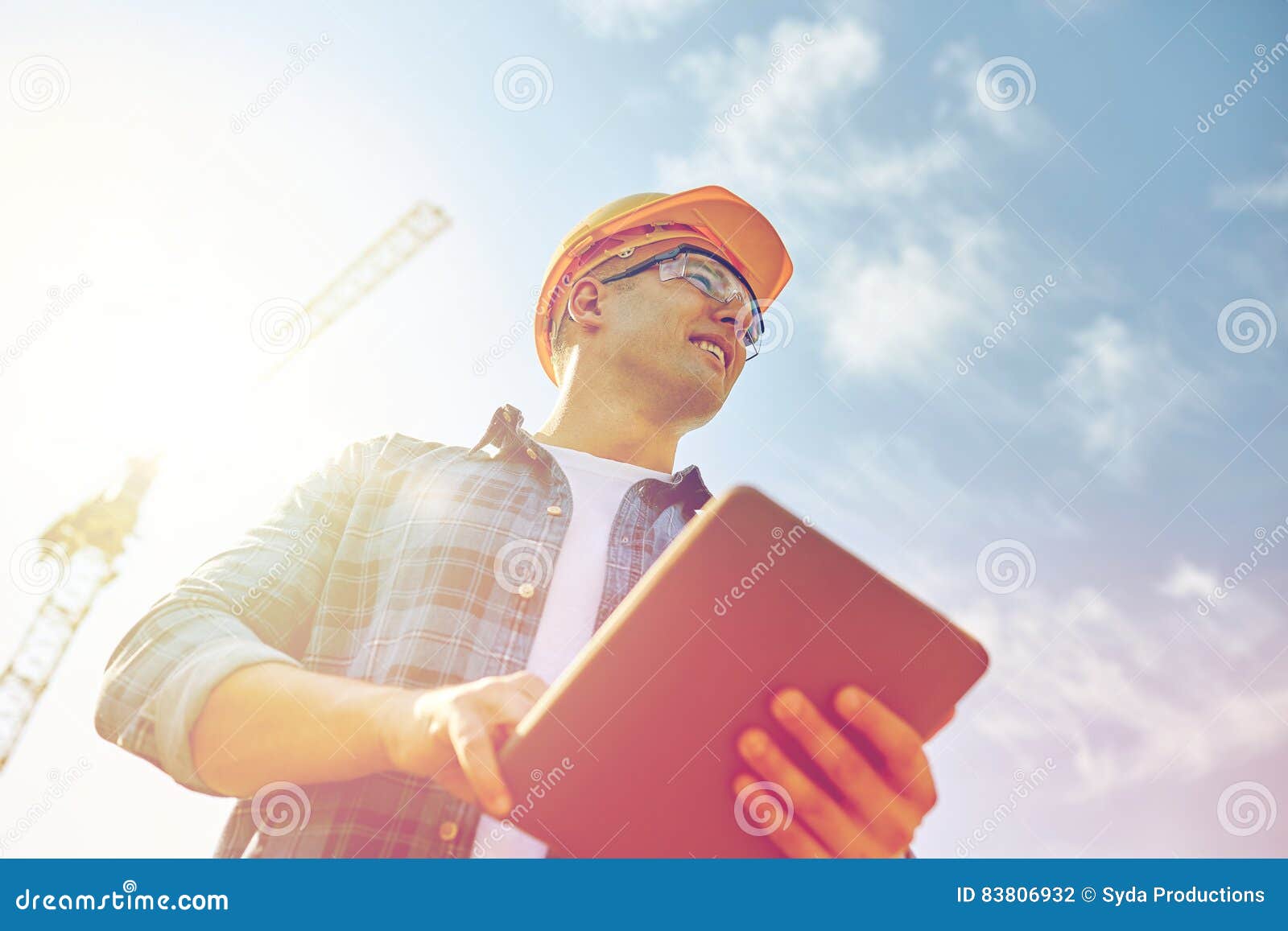 Builder in Hardhat with Tablet Pc at Construction Stock Photo - Image ...