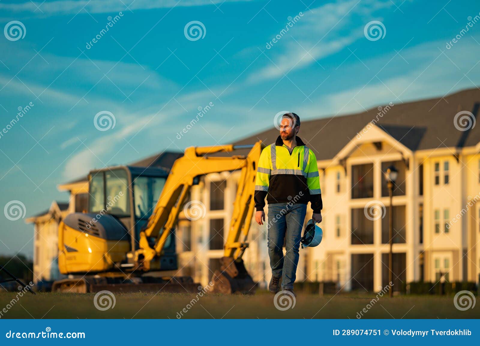 Builder in Helmet on the Construction Site. Stock Image - Image of ...